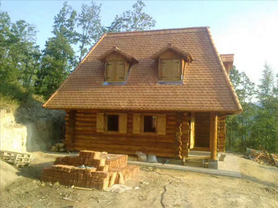 Gradnja brvnare on Vimeo