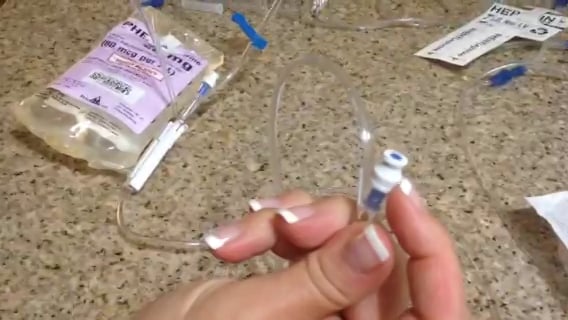 PHARMEDIUM how to spike IV bag prime tubing and lock infusions on Vimeo