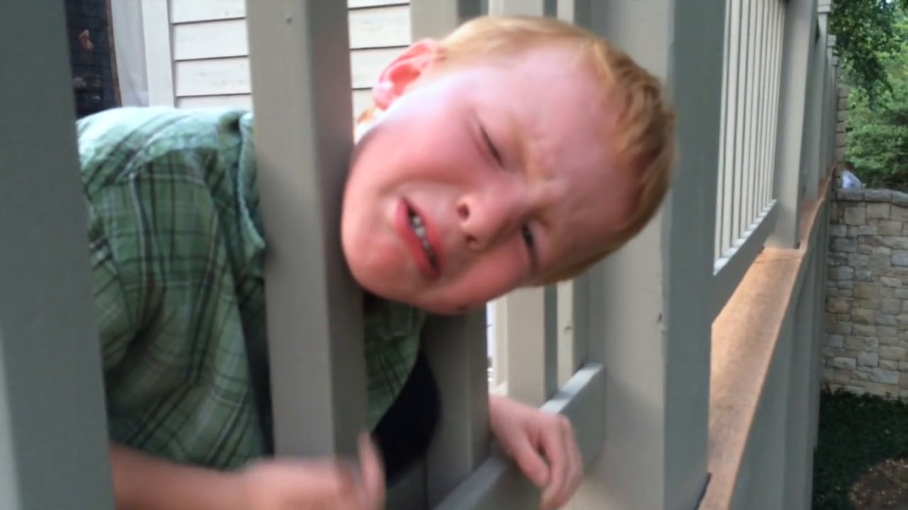 Sad boy gets head stuck in fence on Vimeo