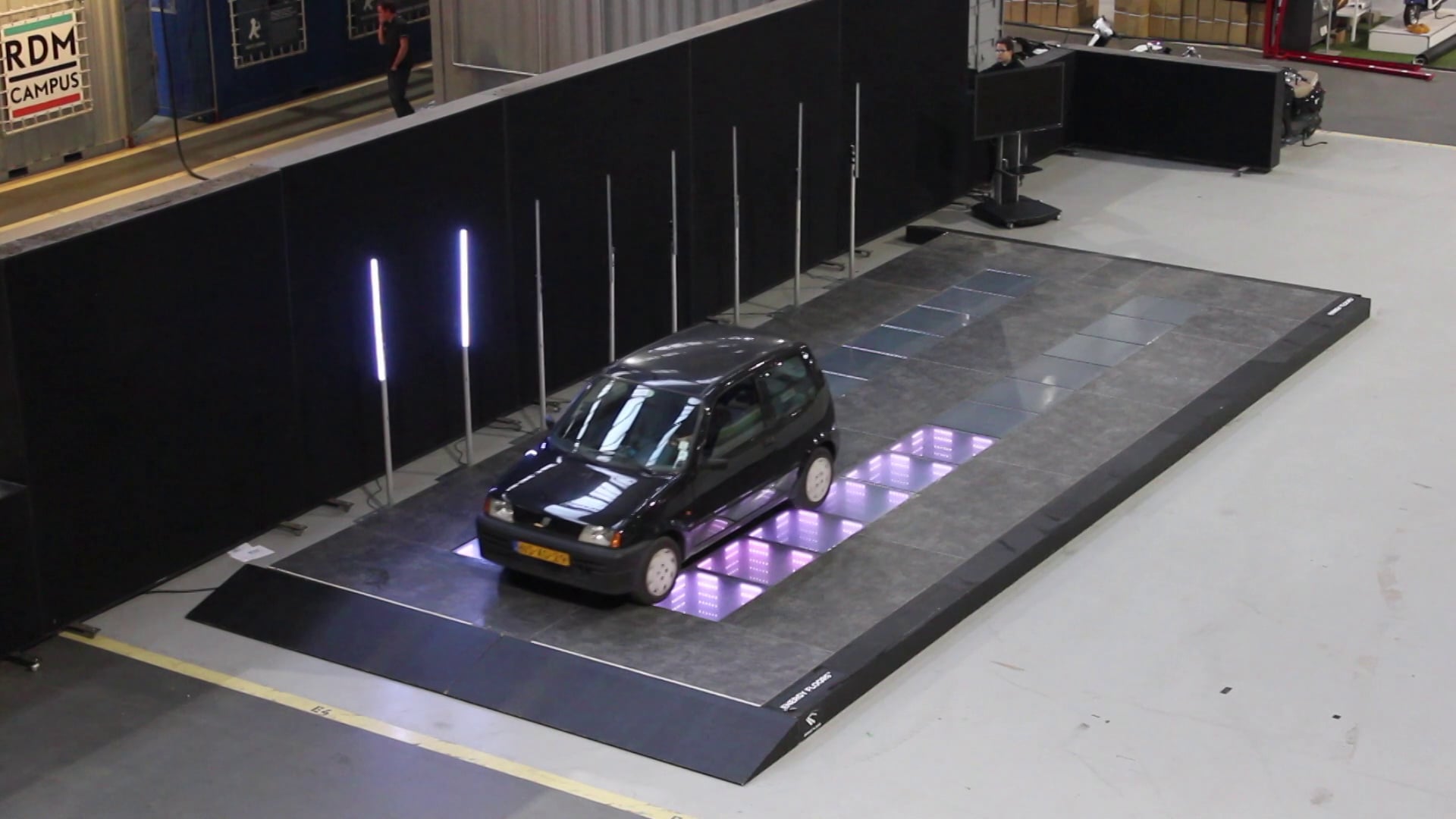 Preview: car generates power by driving on Energy Floor on Vimeo