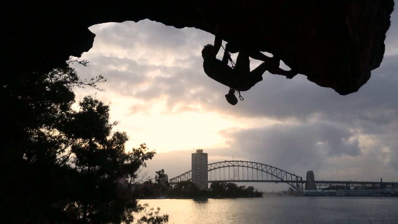 Rock Climbing 'Clocks' in Sydney, Australia at Sunrise