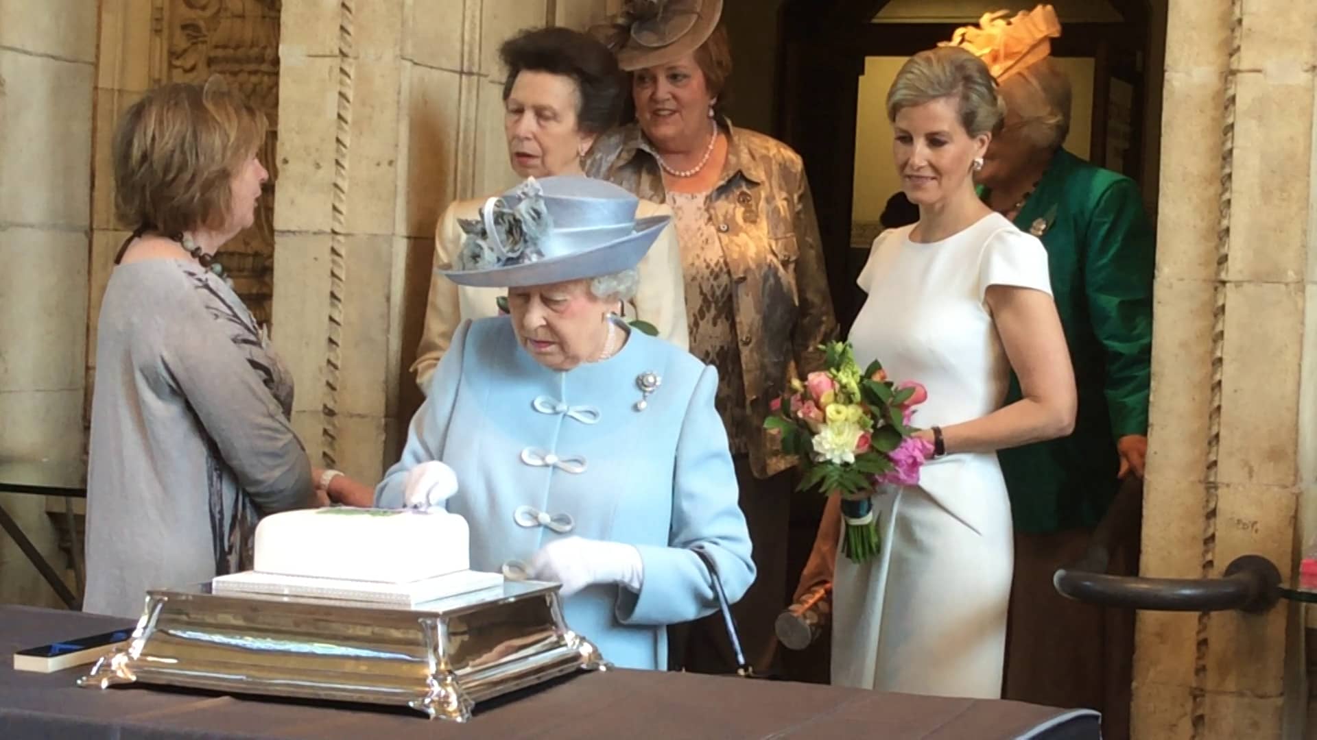 Lovely footage of the Queen cutting a cake with Princess Anne and the ...