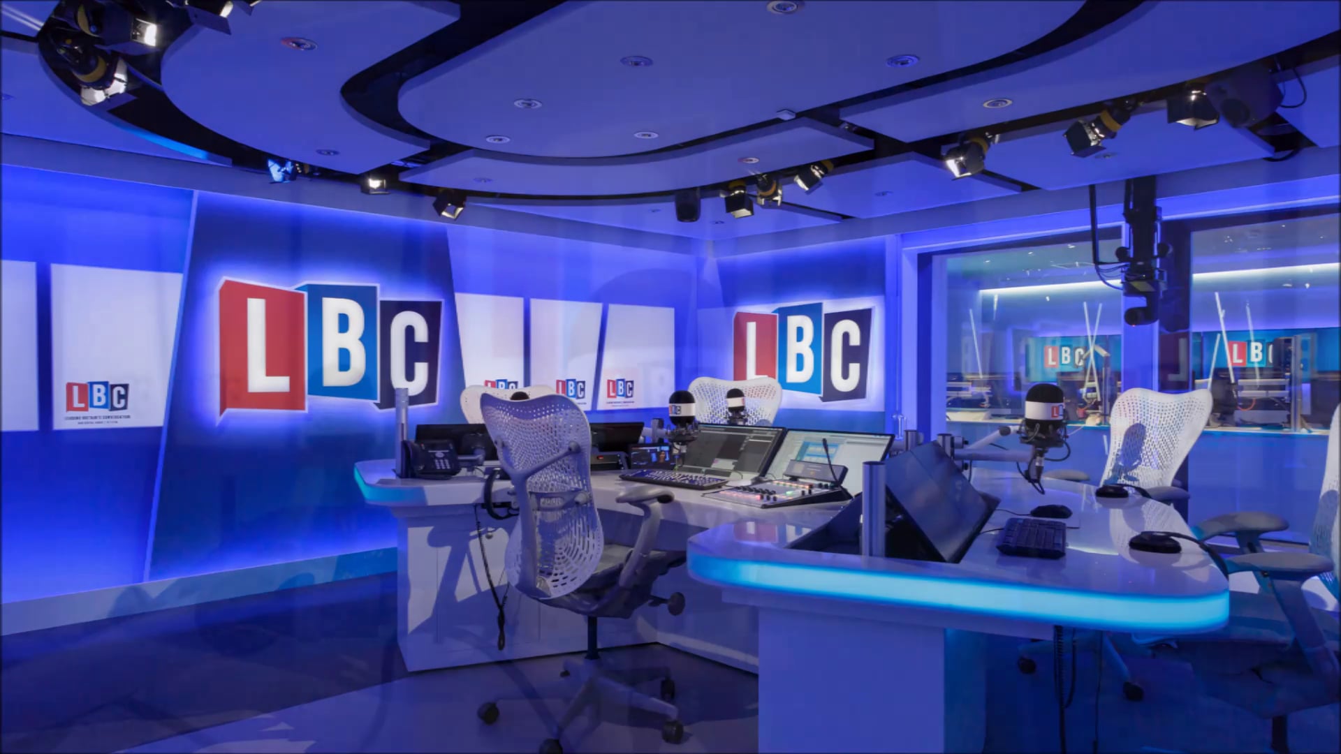 Series of bold fabric-fronted light boxes in LBC's radio studio on Vimeo