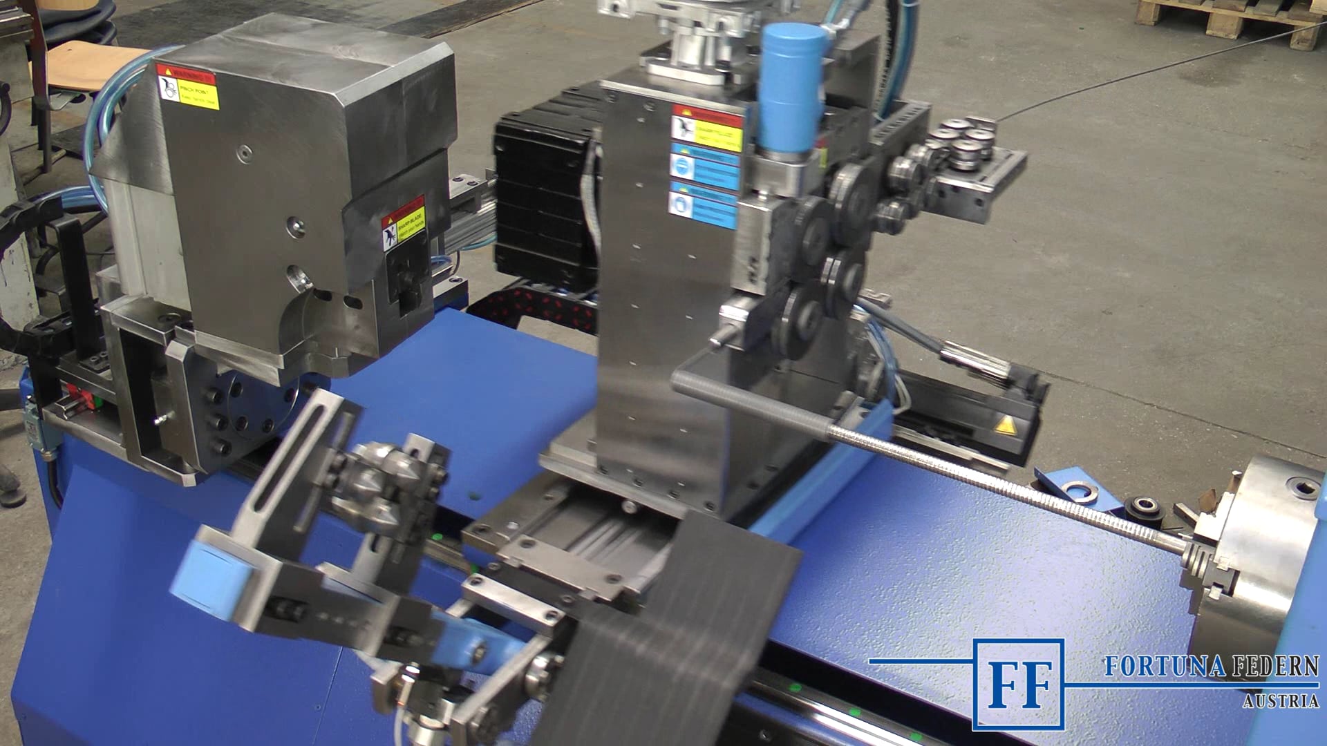 WIM-4 CNC WCS 5AX spring coiling machine by Fortuna Federn on Vimeo