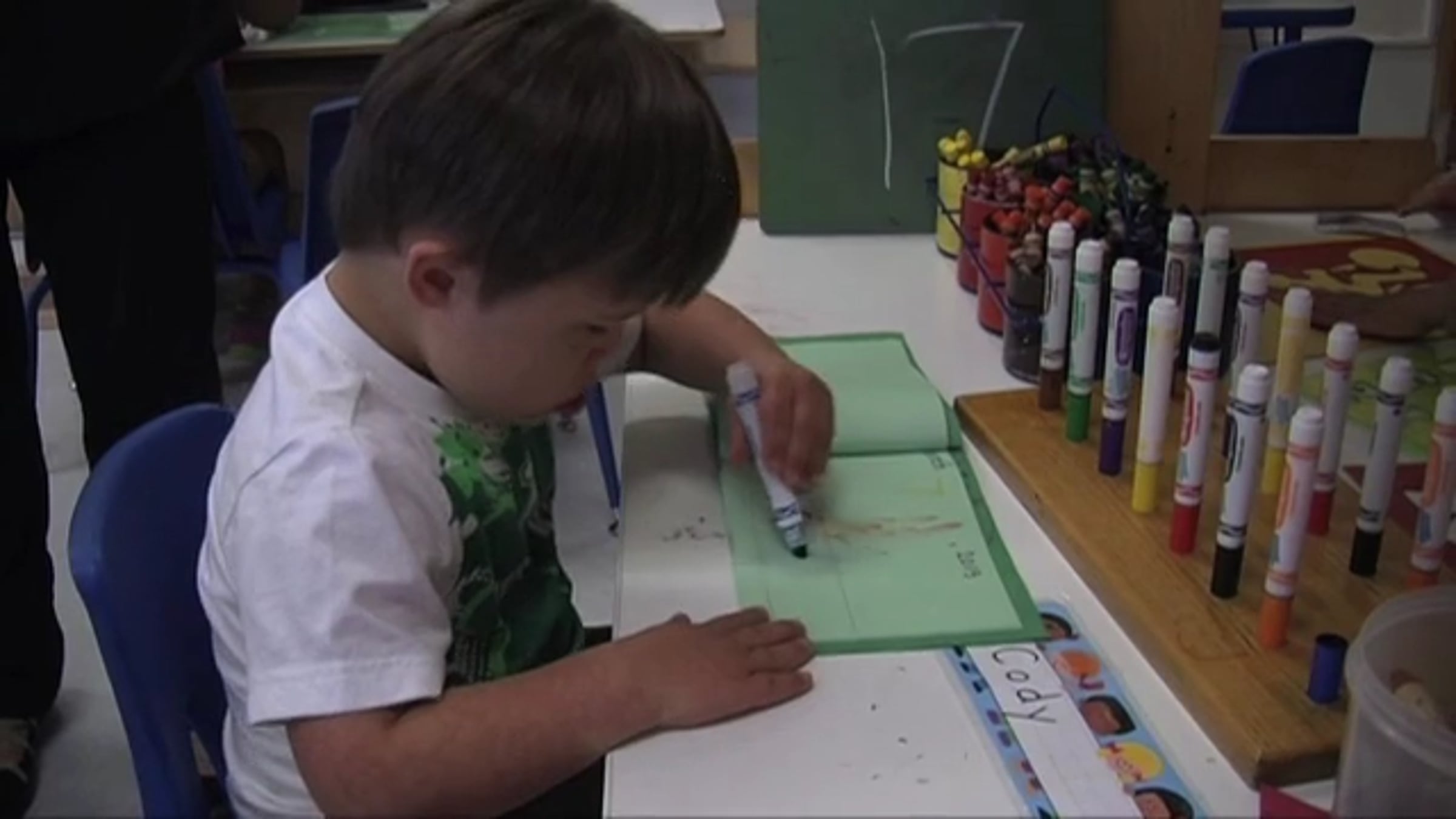 Cody Writing and Drawing