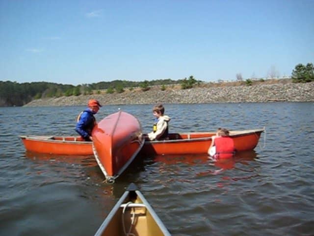 Swamp and Rescue a Canoe and Paddlers - Part 3 - Roll canoe upright and ...