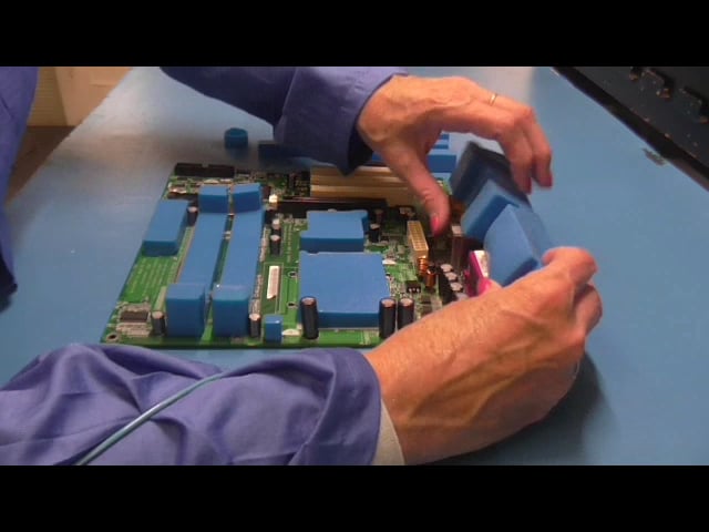 Masking of a circuit board using masking boots before conformal coating ...