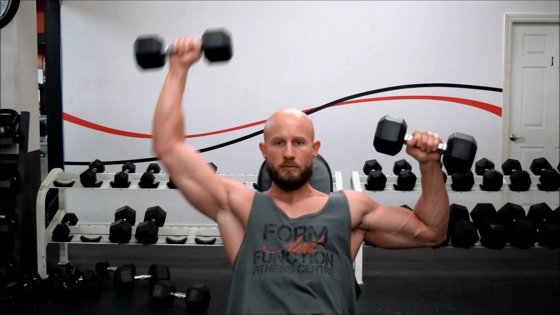 Static Hold Dumbbell Shoulder Press on Vimeo
