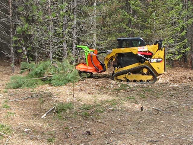 SS Mini Might Disc Mulcher Skid Steer on a standard Flow CAT 259D on Vimeo