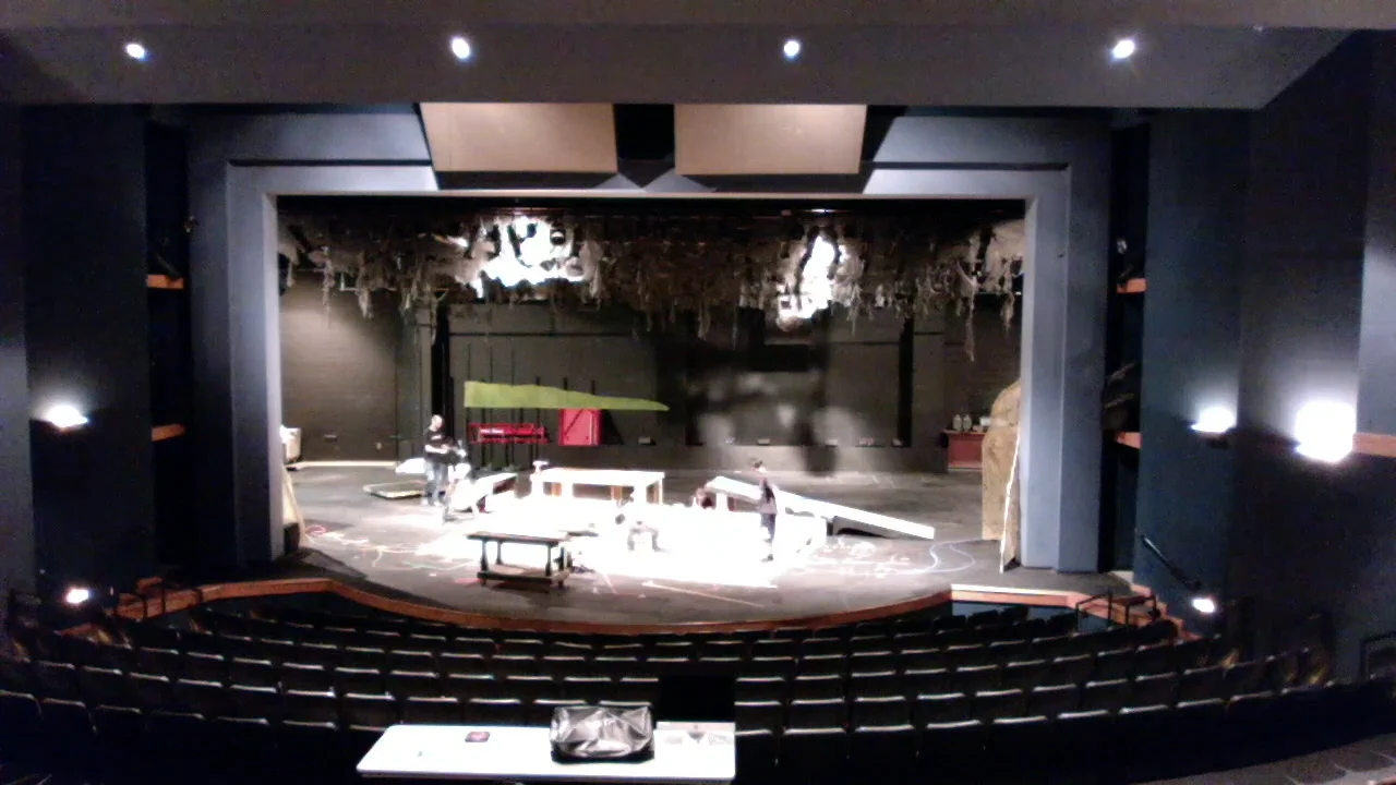 Raked Stage Load-In for Trojan Women