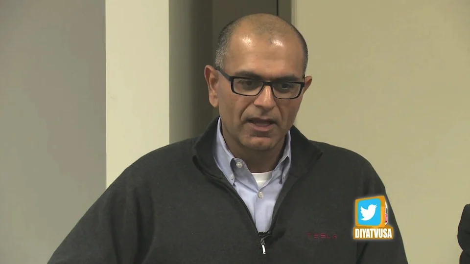 Tesla CFO Deepak Ahuja discusses Elon Musk and the auto industry