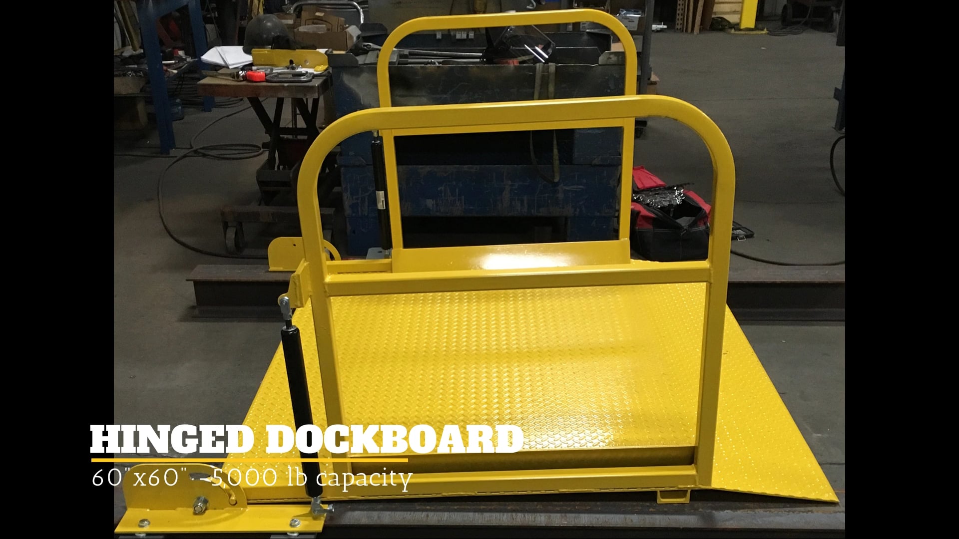 Hinged Dock Plate w/ Gas Springs on Vimeo