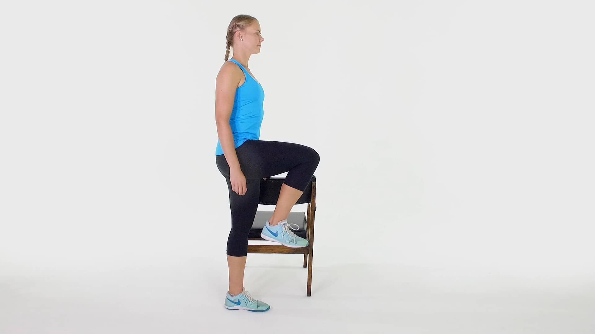 Standing Open Chain Hip Flexion with Bent Knee and Support on Vimeo