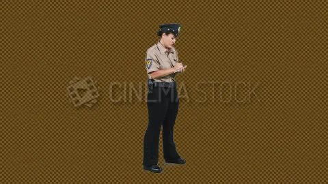 CinemaStock - Greenscreen - Female cop looks around as she writes in ...