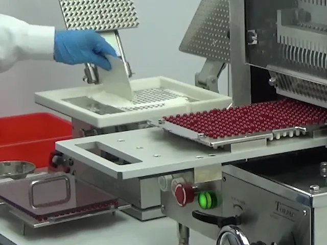 ProFiller X900 - 300 hole Capsule Filling System on Vimeo