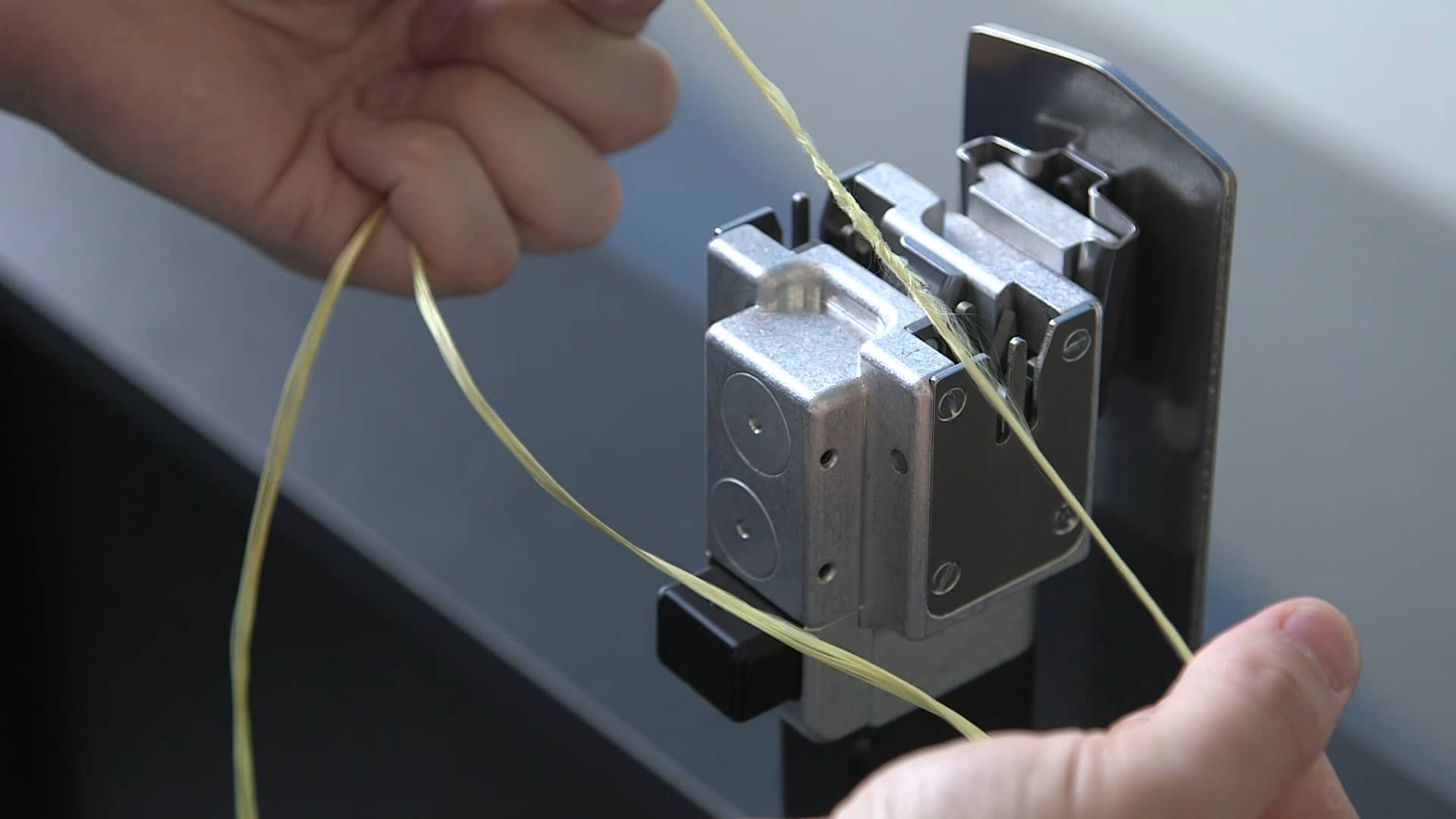 Airbond - Model 1-11 Splice Demonstration on Aramid 300Tex on Vimeo