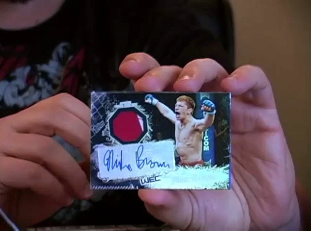 UFC's Bruce Buffer Opens Up a Box of UFC Topps Cards on Vimeo