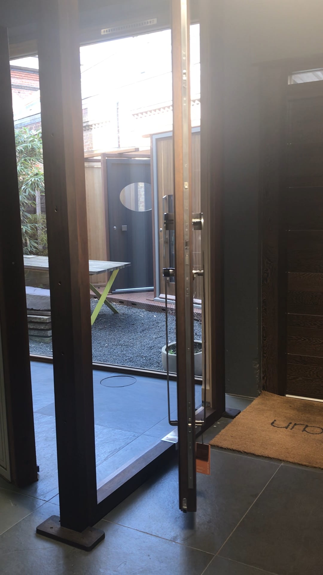 Sprung pivot door in showroom on Vimeo