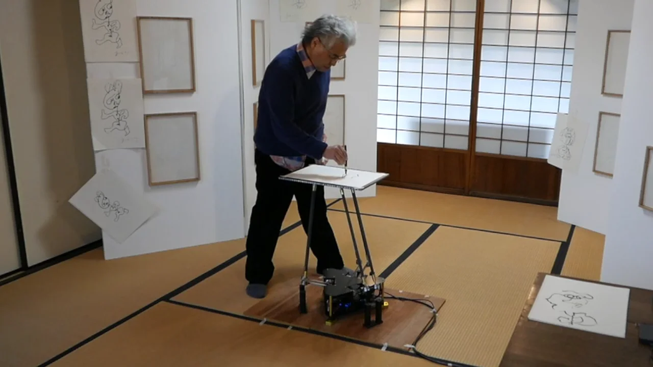 T.T.T.Bot (Turning Table Tripod Robot, Conta )