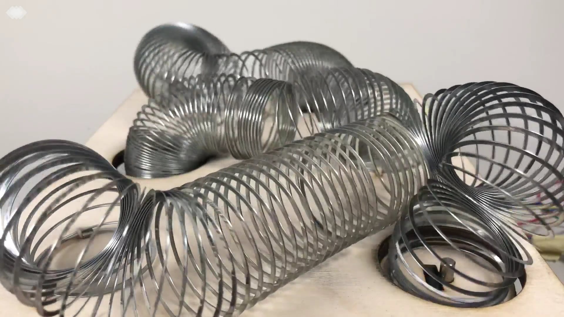 Three Slinkies on Vimeo