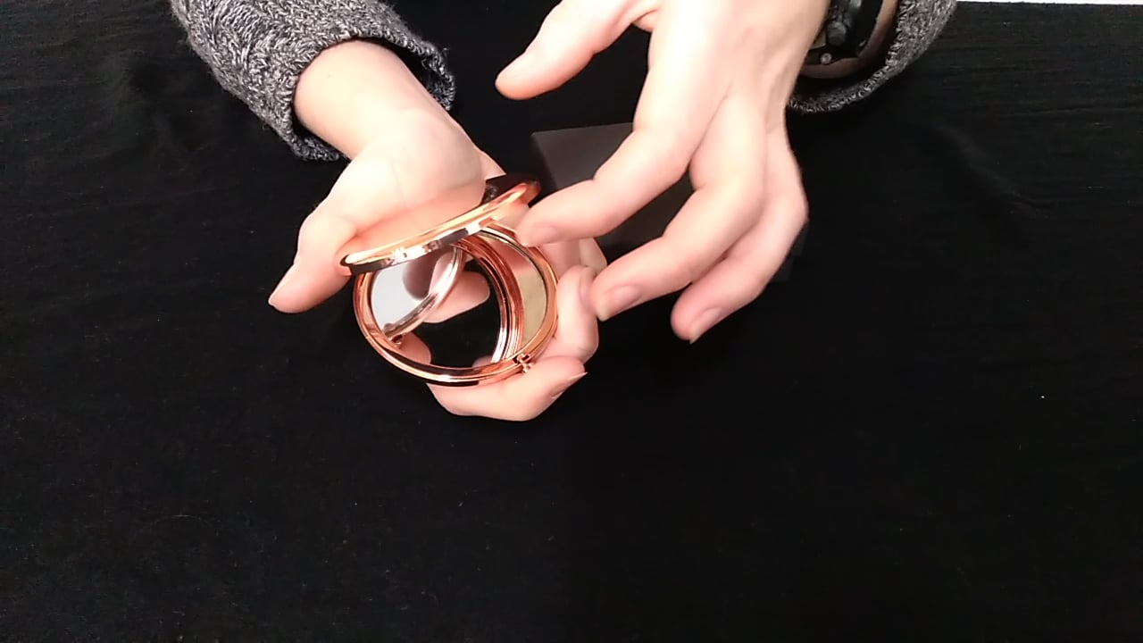 Round rode gold pocket mirror on Vimeo