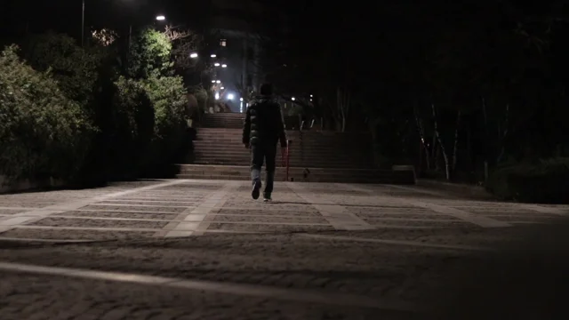 Man Walking At Night