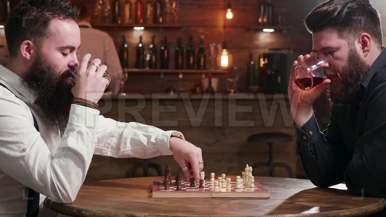 Drinking While Playing Chess Stock Video on Vimeo