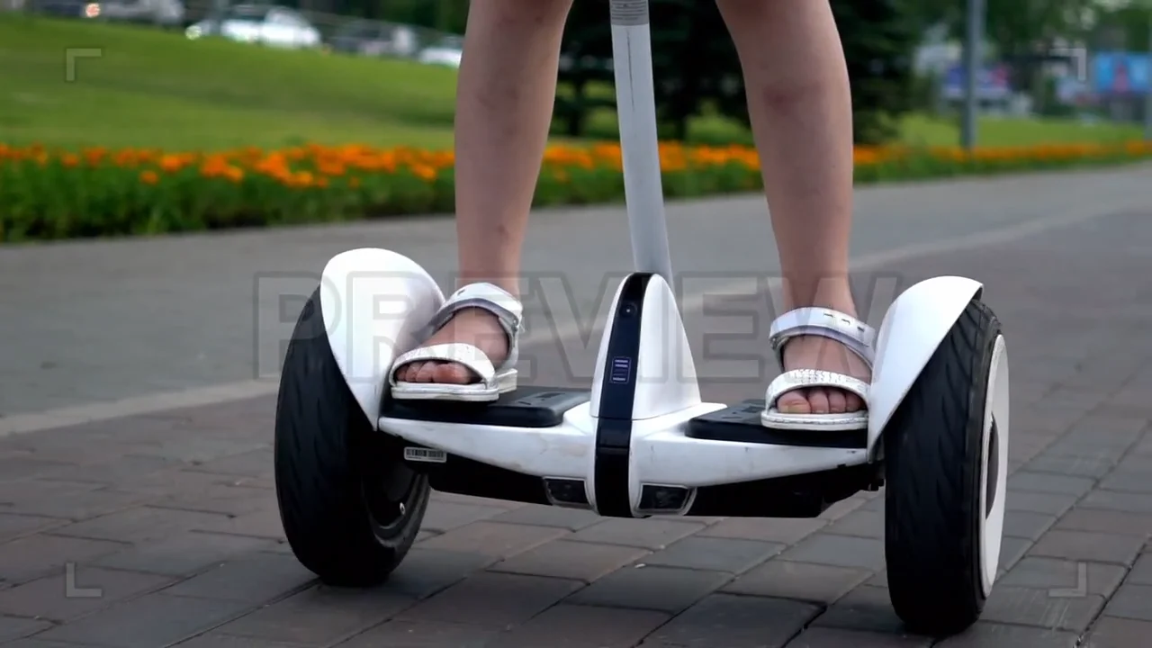 Girl Rides On Gyro Scooter Stock Video