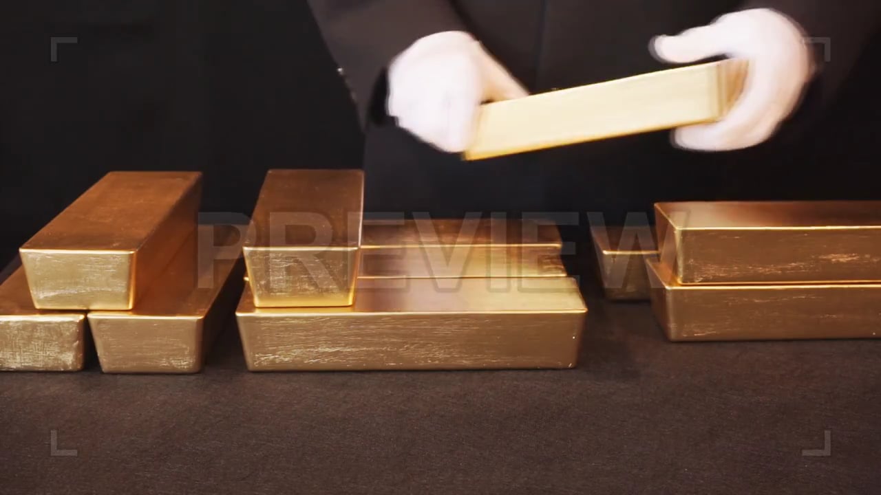 Stacking Gold Bars Stock Video on Vimeo