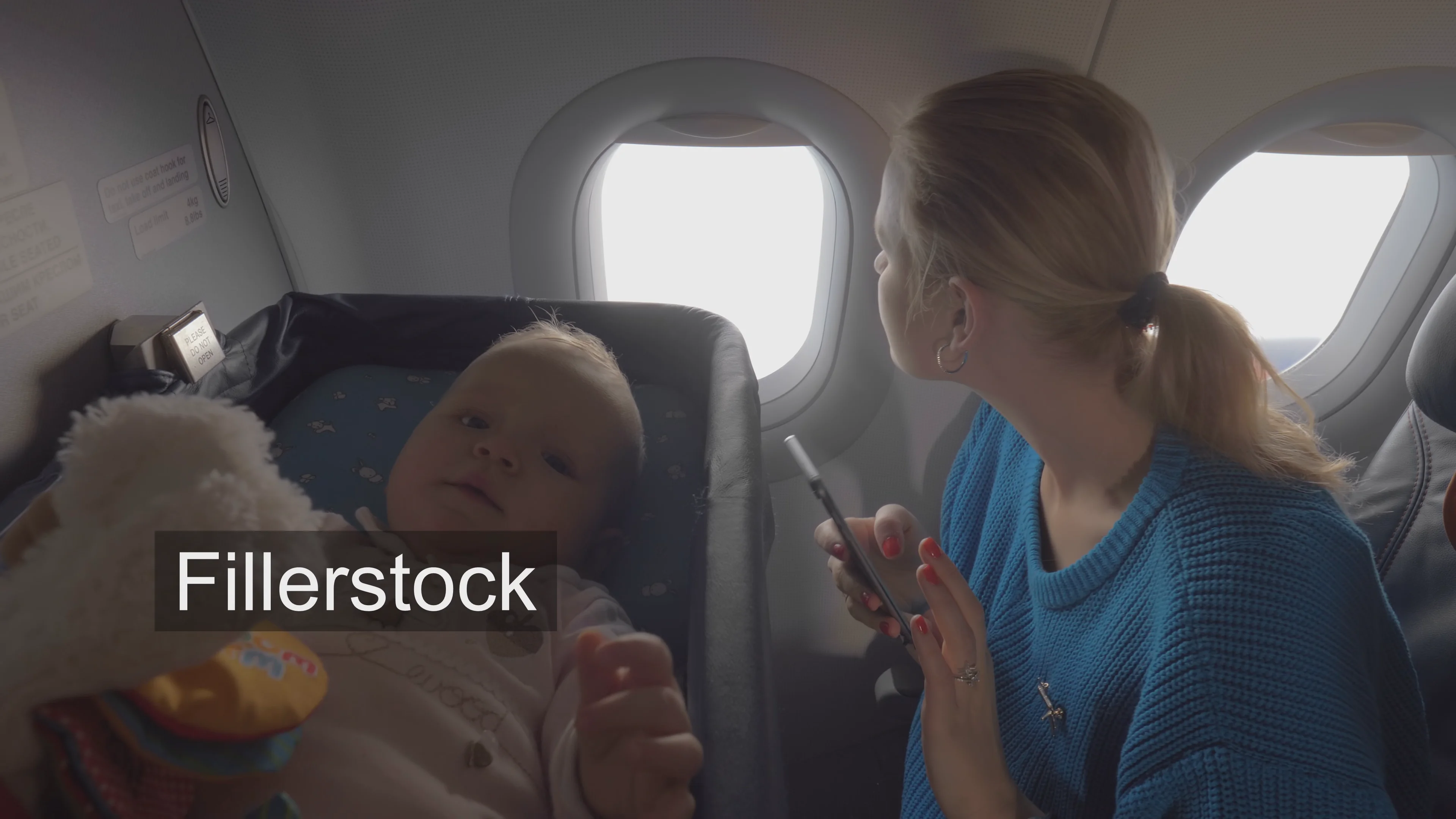 Baby in a cot on an airplane on Vimeo