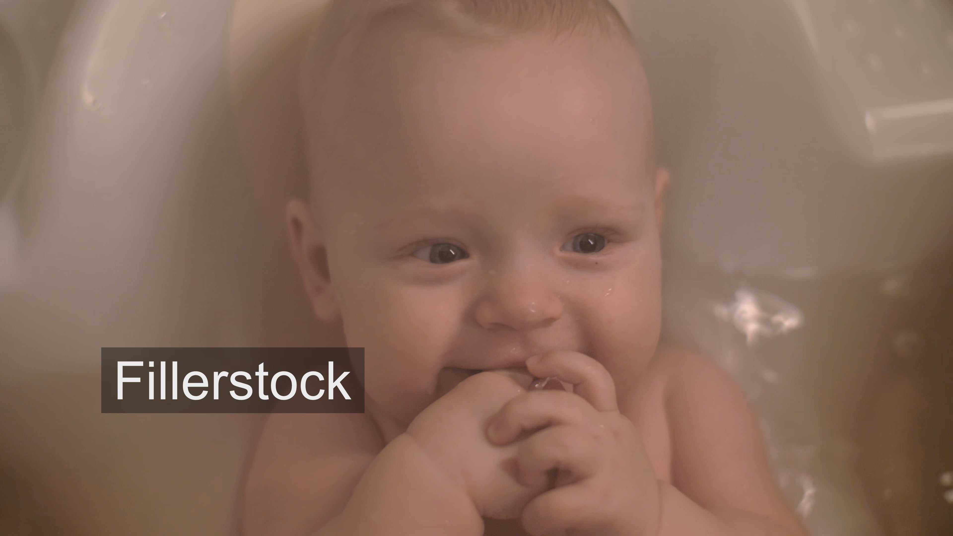 Smiling baby girl bathing on Vimeo