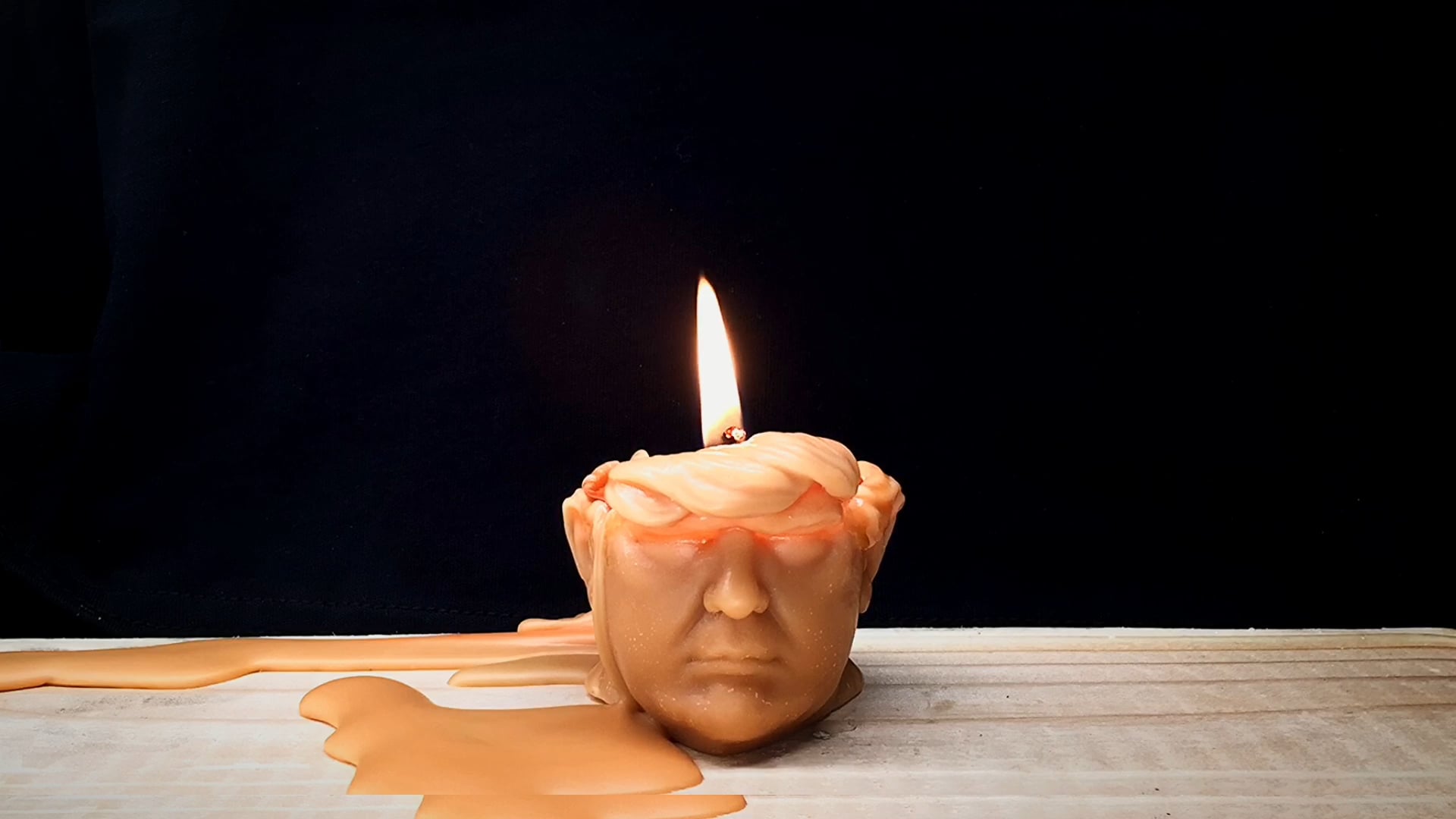 Donald Trump Hot Head Candle burning on Vimeo