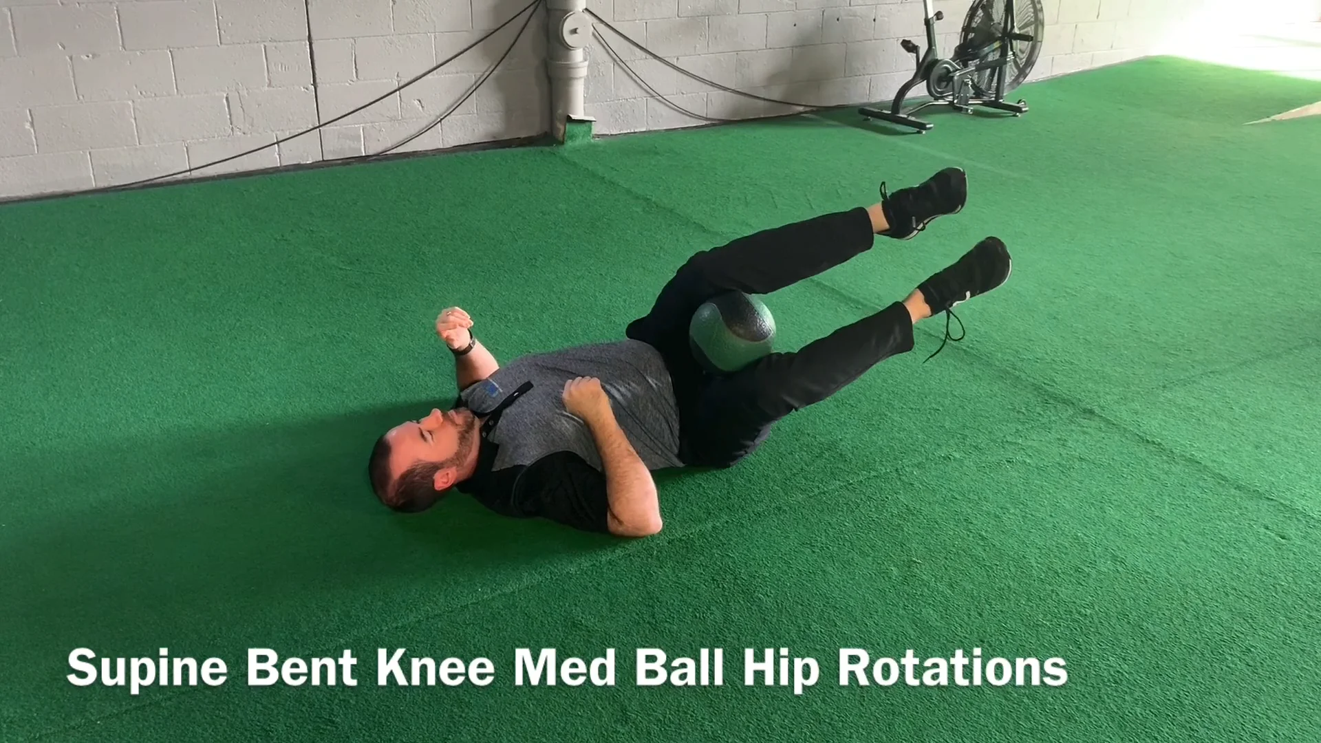 Supine Bent Knee Med Ball Hip Rotations on Vimeo