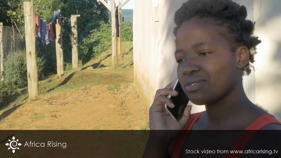 African stock video of black rural girl talking on cellphone telephone ...