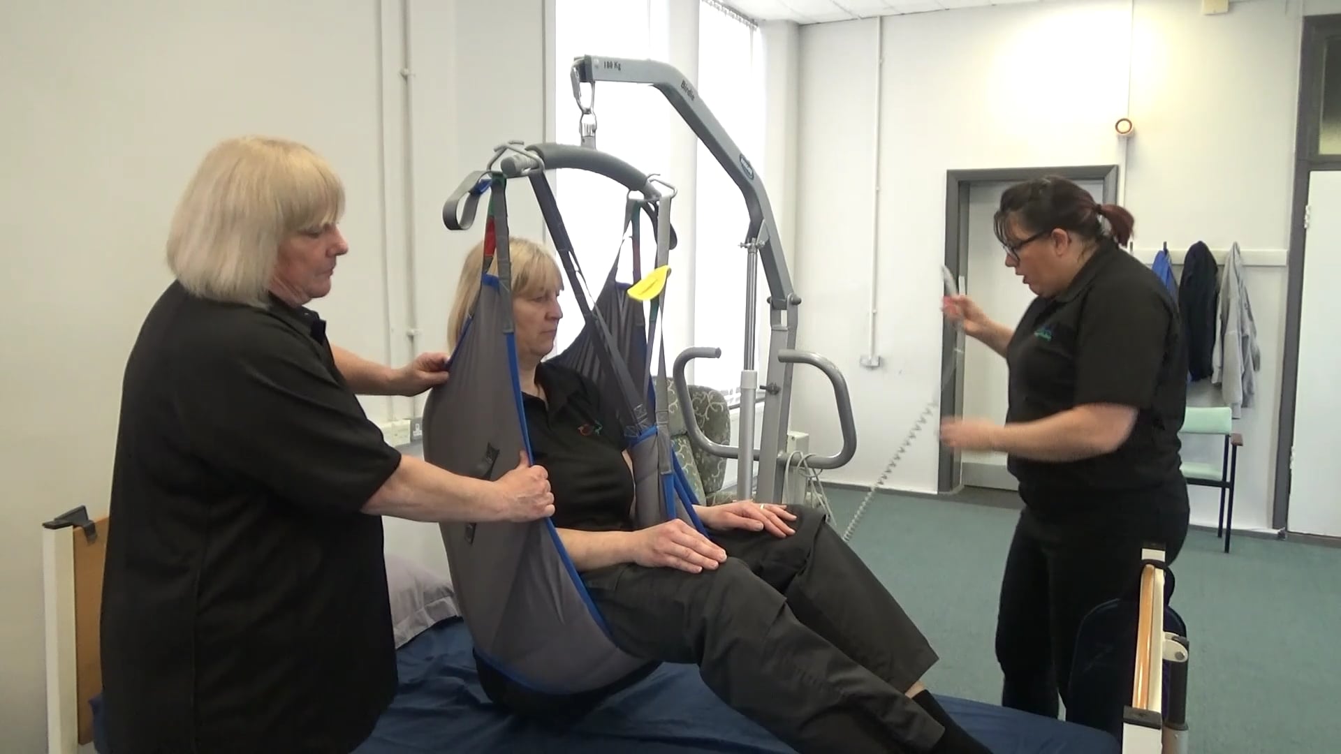 Hoisting from a chair to a bed on Vimeo