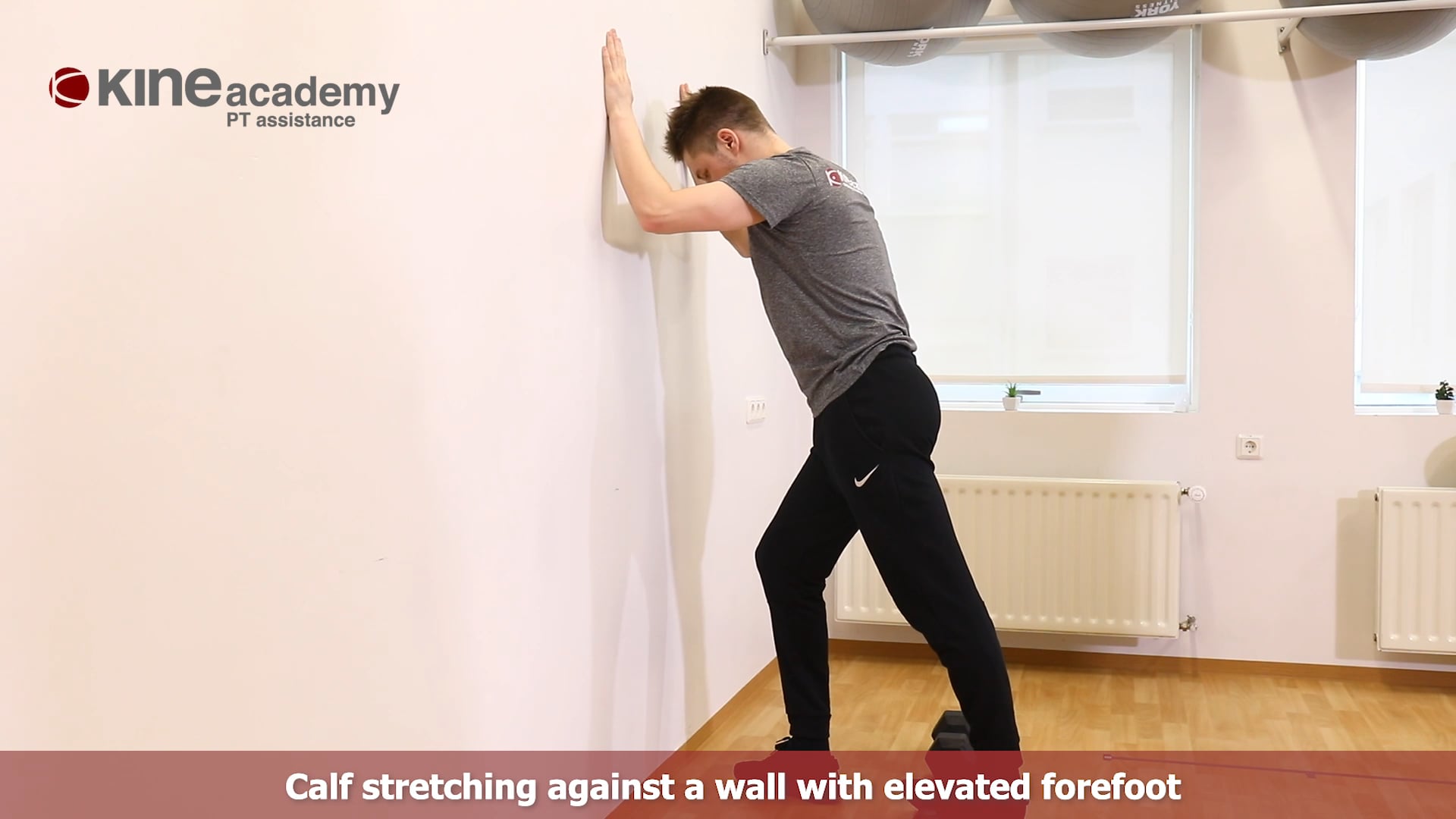 Dynamic calf stretching against a with with elevated forefoot on Vimeo