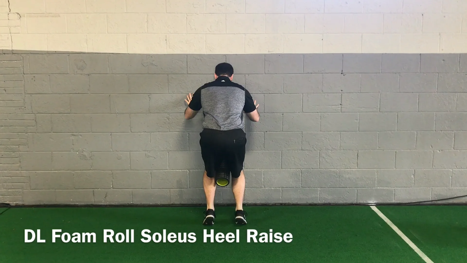 Double Leg Foam Roll Soleus Heel Raise on Vimeo