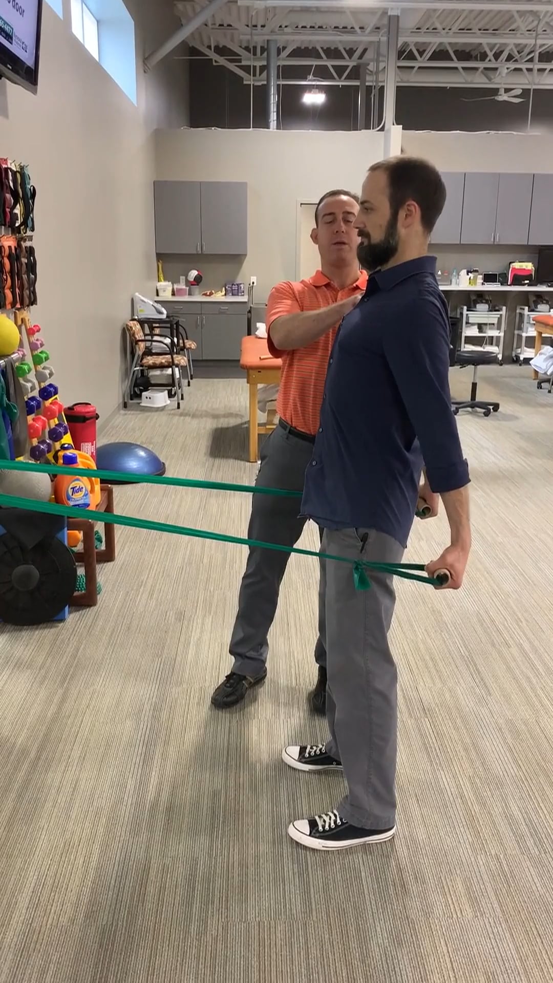 Shoulder extensions with theraband on Vimeo
