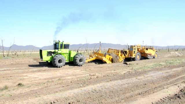 Loading a Steiger Tiger Scraper Tractor on Vimeo