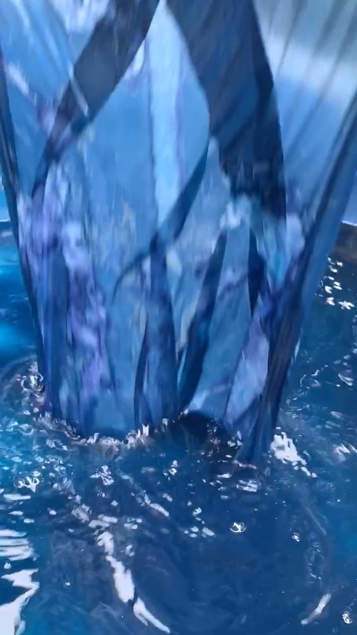 Rinsing silk cyanotype in water after sun exposure on Vimeo