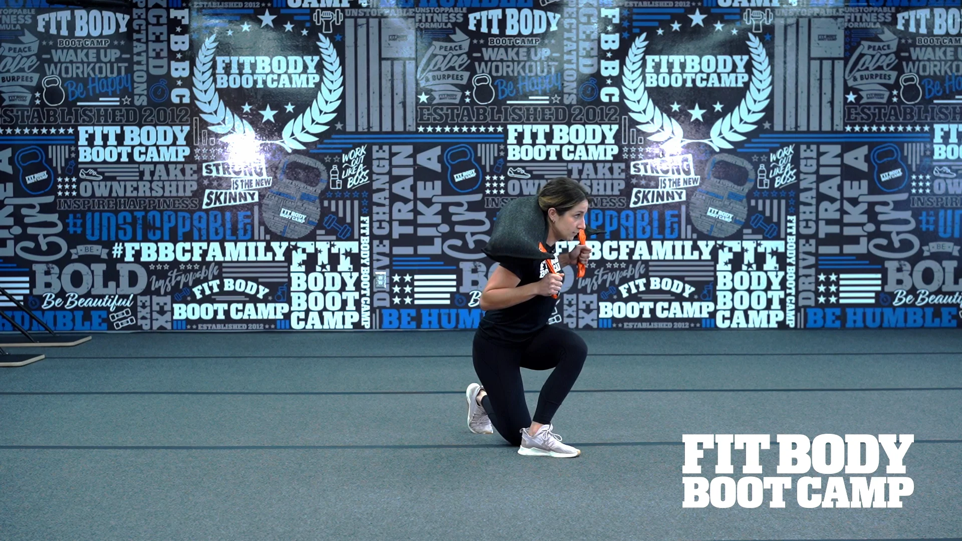 Sandbag Back Hold Curtsy Lunge on Vimeo