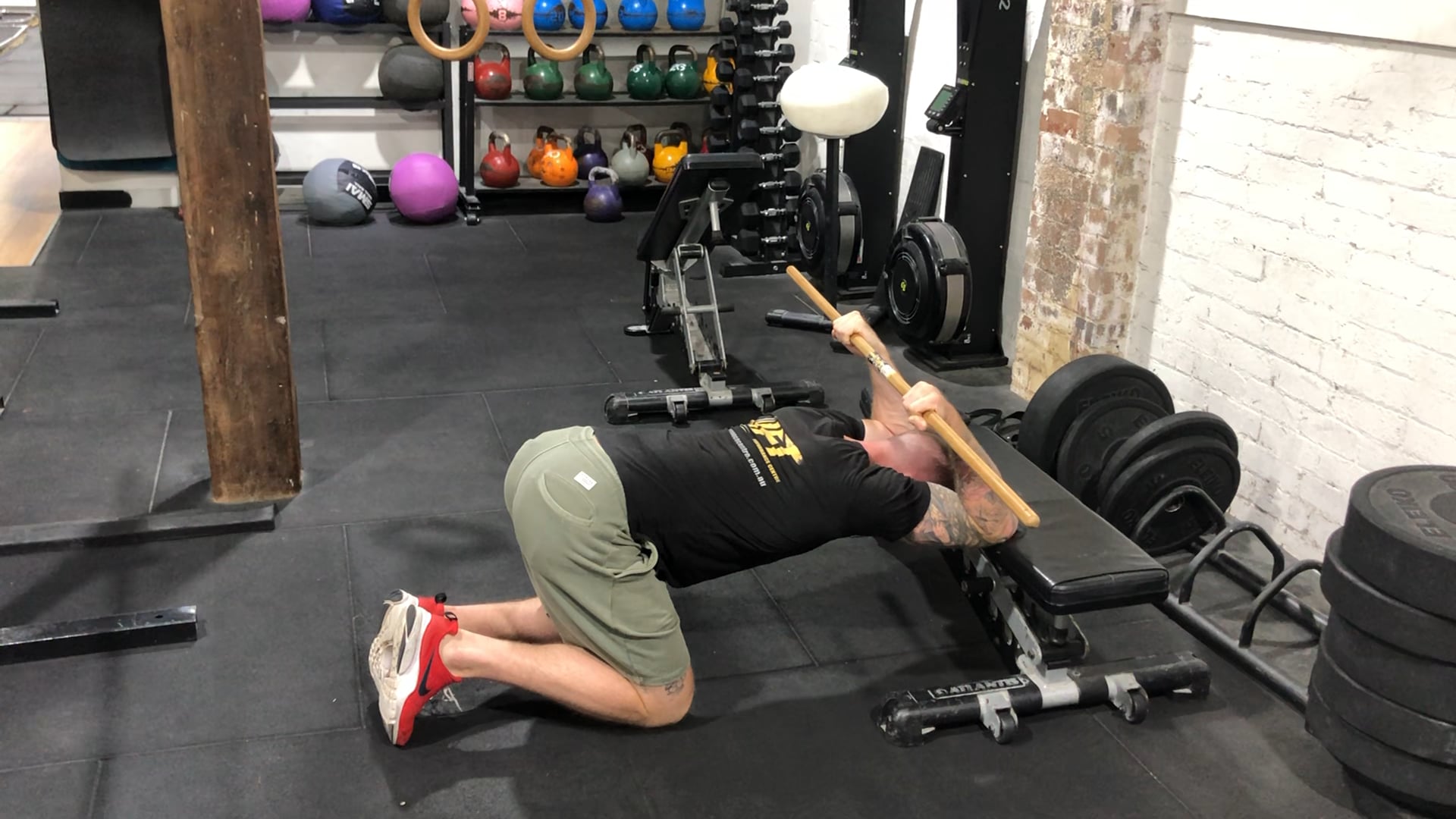 Thoracic spine/ lat stretch with dowel on Vimeo