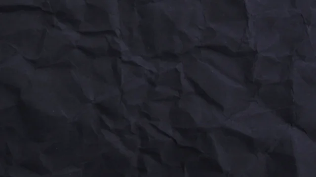 Black Crumpled Paper Background