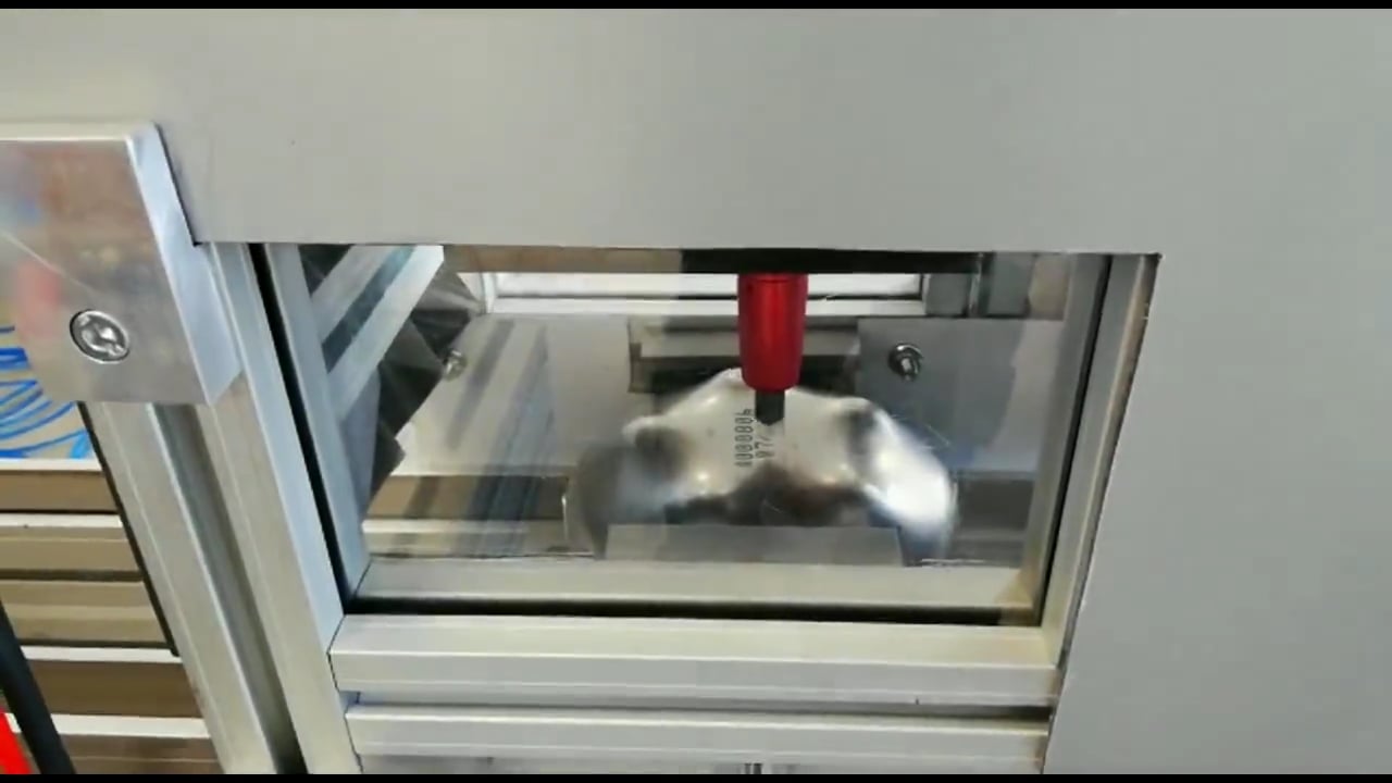 Production line-integrated ADP machine marking on fire estinguisher ...