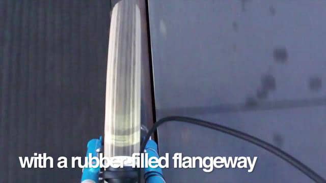Biking on railroad tracks with rubber-filled flangeway on Vimeo