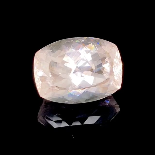 Calcite (large pink stone) | Mexico